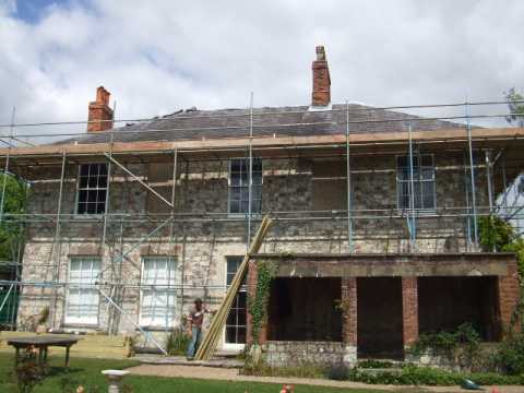 TM Building in Fleet Hampshire - re-slate & re-tile roof