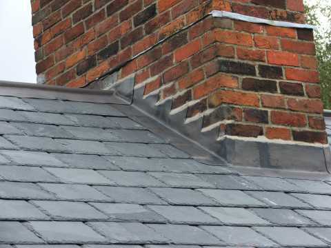 TM Building in Fleet Hampshire - re-slate & re-tile roof