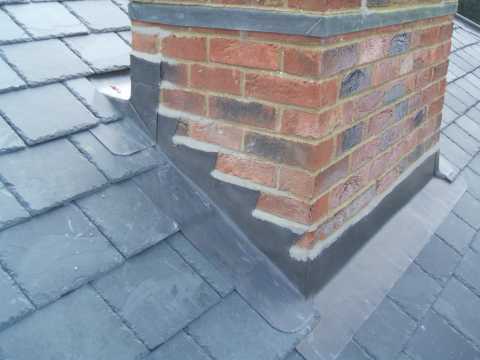 TM Building in Fleet Hampshire - re-slate & re-tile roof